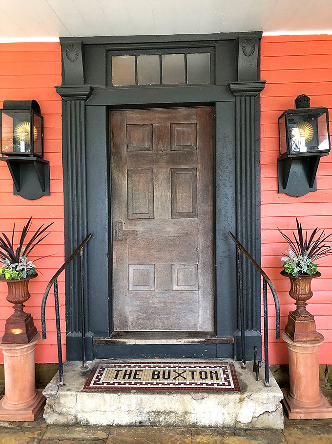 The Buxton Inn's entrance isn't just a doorway—it's a time portal to 1812, complete with lanterns that have witnessed two centuries of American history.
