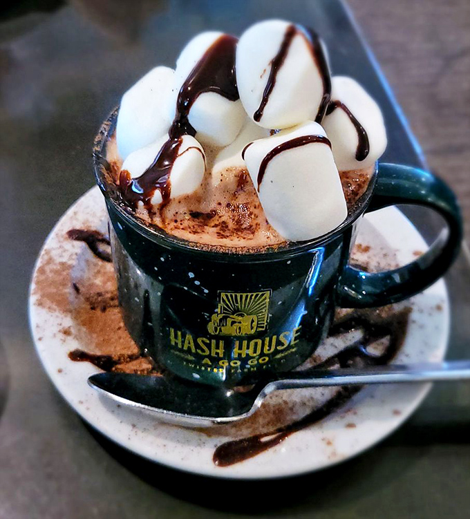 This isn't just hot chocolate&mdash;it's a marshmallow hot tub party in a mug. Chocolate drizzles make it formal attire.