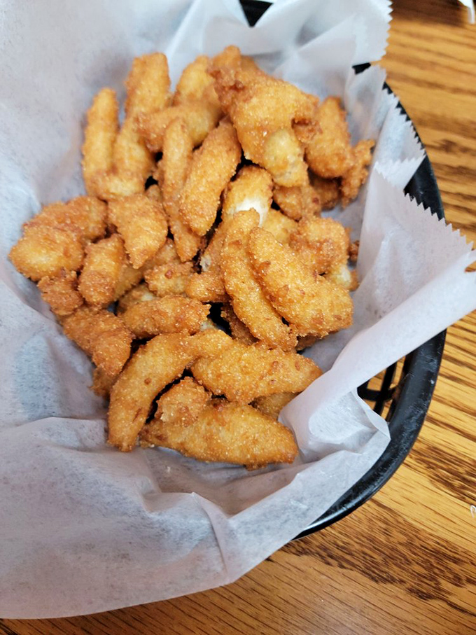 Hush puppies: golden-fried cornmeal orbs of joy. The perfect supporting actors in the blockbuster movie that is Lexington barbecue.
