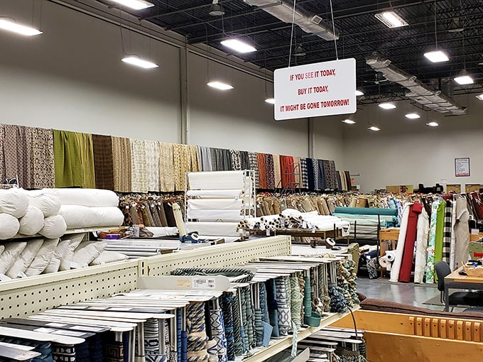 The sign says it all: "If you see it today, buy it today." Fabric shopping as an extreme sport with real consequences.