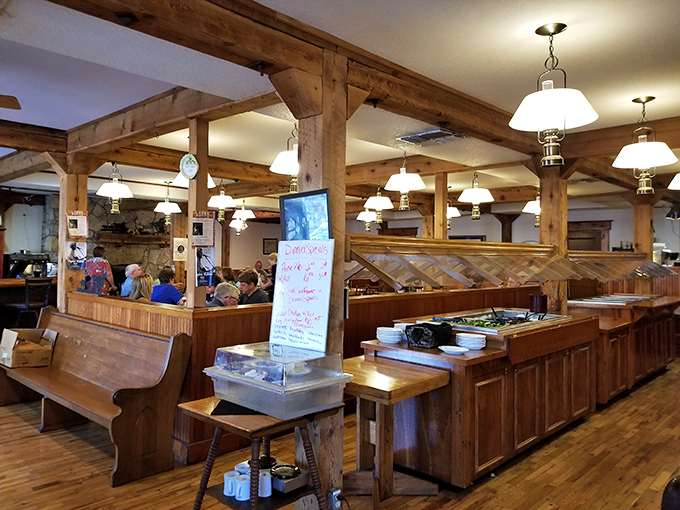 Exposed beams, classic lighting, and church pew seating create an atmosphere that's both reverent to history and comfortably inviting.