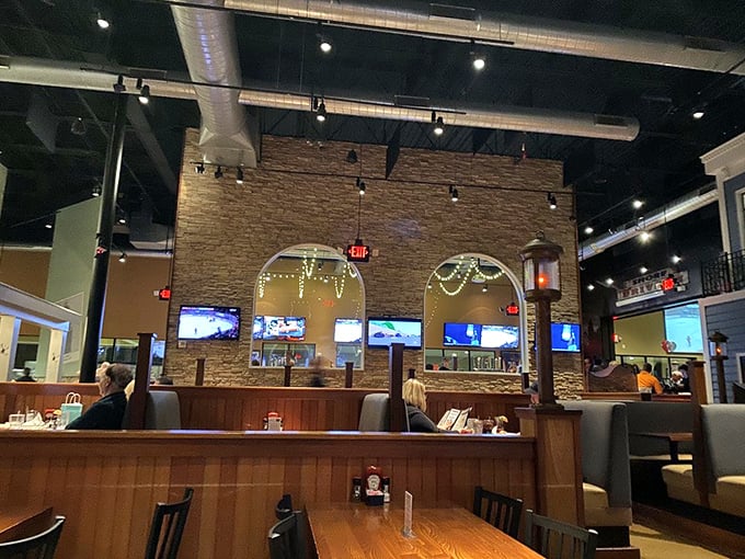 The interior architecture creates intimate dining zones within the larger space&mdash;like having your own private restaurant within a restaurant.