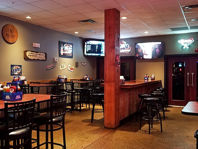 Wood accents and beer signs create that essential BBQ joint atmosphere&mdash;unpretentious, welcoming, and focused on what matters most.
