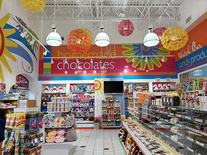 Bursts of color from every angle, with hanging decorations that make the ceiling as enticing as the candy below. Sensory overload in the best way.