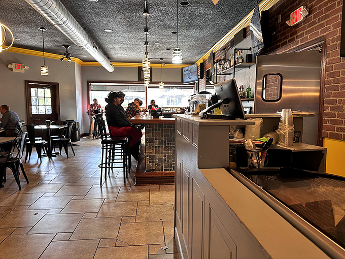 The open concept layout lets you witness the magic happening. Like a theater where the performance is culinary and the standing ovation is inevitable.