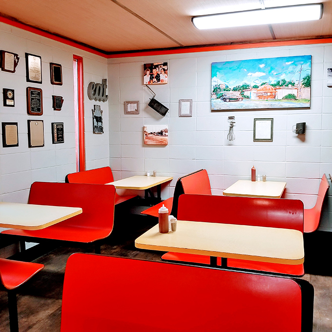 Red booths against white walls create the diner equivalent of a Norman Rockwell painting. Each table has hosted thousands of conversations, confessions, and coffee refills.