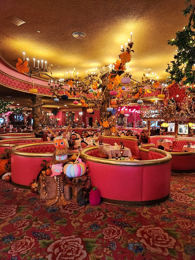 Dining pods of pink velvet surrounded by whimsical trees create the feeling you're eating in some fabulous fairy's living room.