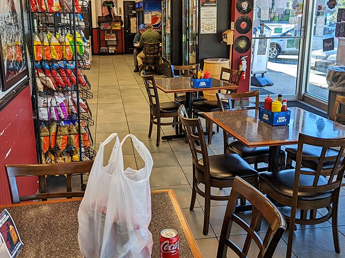 Simple tables, tiled floors, and the anticipation of greatness. In the temple of casual dining, sometimes the most unassuming spaces hold the greatest treasures.