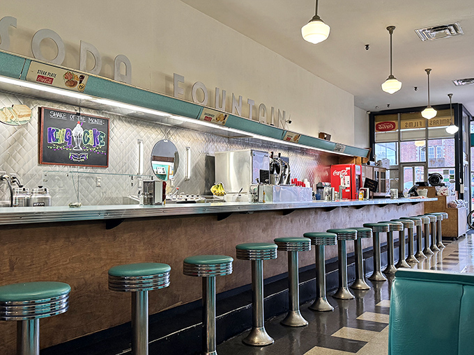 The soda fountain counter: Where strangers become regulars, regulars become friends, and everyone gets the same warm welcome regardless.