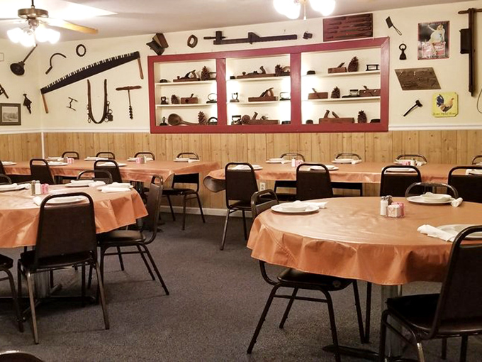 Vintage tools line the walls like badges of honor, telling stories of rural ingenuity while you feast on timeless comfort food.
