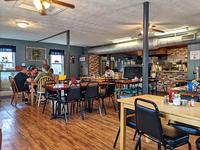 The dining room hums with conversation and clinking silverware—a symphony of satisfaction that plays daily at this beloved local institution.