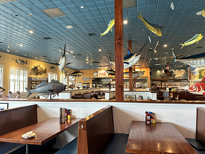 Fish suspended from the ceiling keep watchful eyes on diners below, creating the whimsical feeling of eating in an underwater clubhouse for grown-ups.