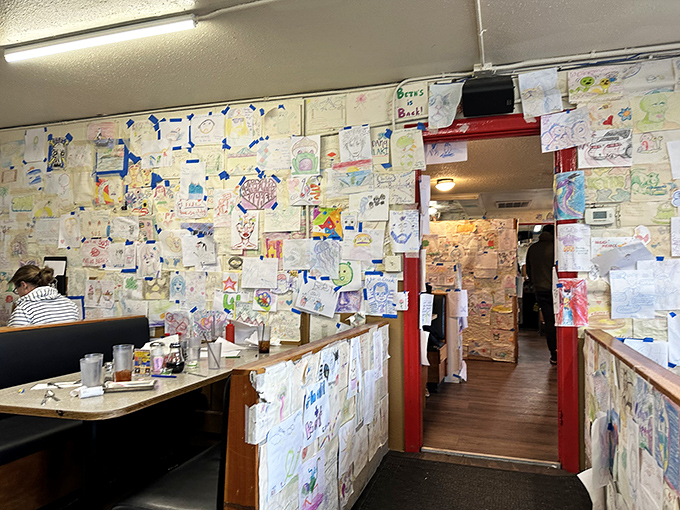 Every inch of wall space serves as a customer gallery &ndash; drawings range from artistic masterpieces to "I was here at 3 AM and had thoughts."