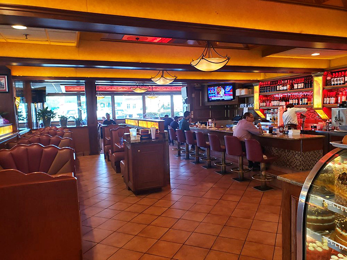 The counter seating offers front-row tickets to the culinary show. Some people watch sports; others watch pancakes being flipped with Olympic precision.