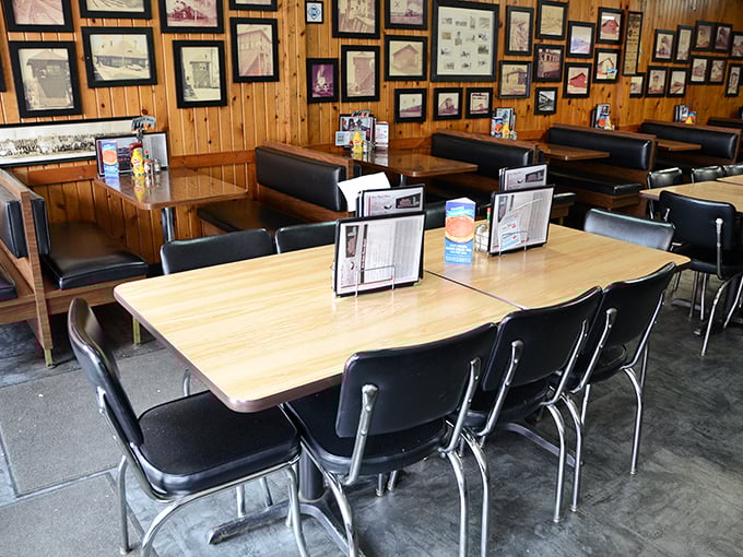 Those vintage photos lining wood-paneled walls aren't just decoration – they're a visual timeline of Huntington's living history.