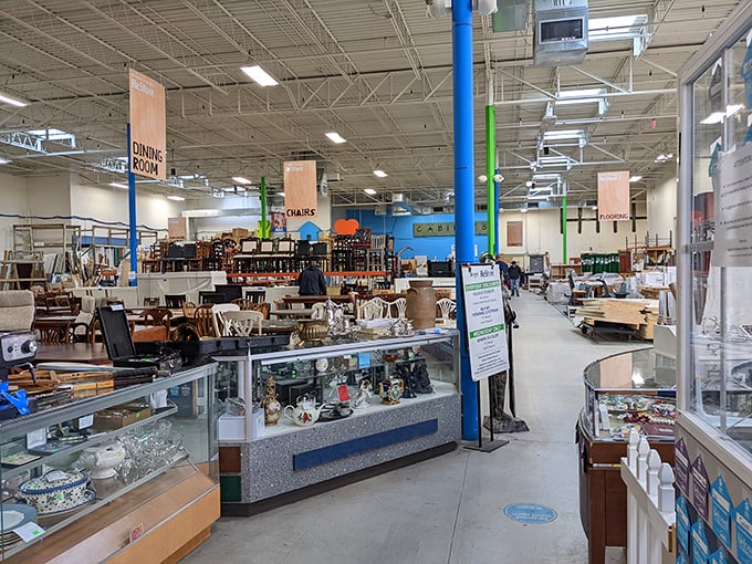 An organized chaos of possibilities where dining sets and display cases wait patiently for their "forever homes."