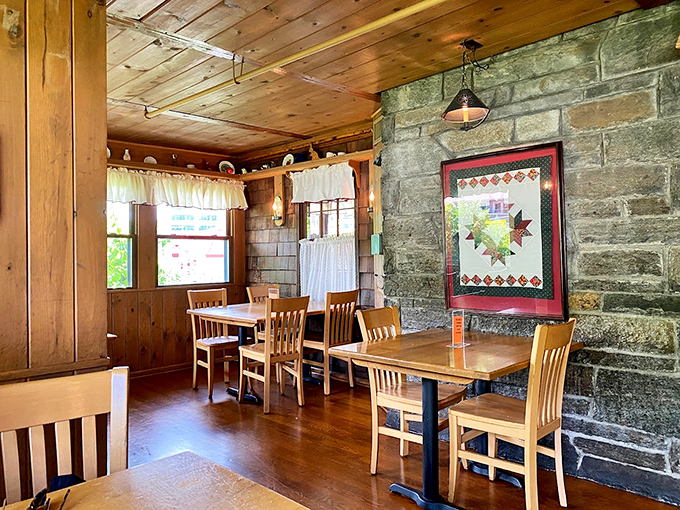 Stone walls and wooden beams frame dining spaces that feel more like your favorite aunt's country home than a restaurant.
