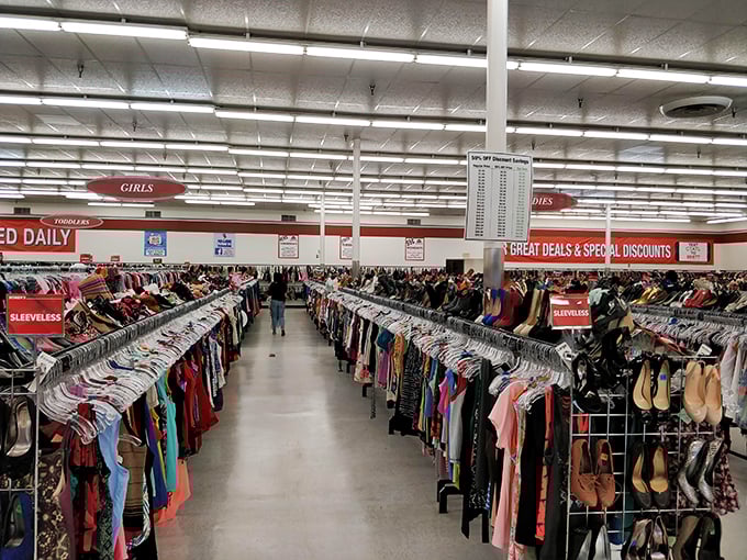 The women's section stretches into infinity. Those "SLEEVELESS" signs are the North Star for summer wardrobe navigators.