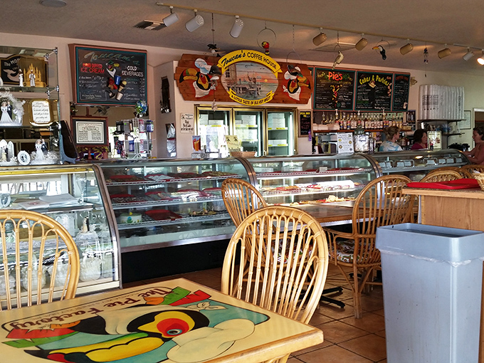Wooden chairs and toucan-themed tables create the perfect backdrop for serious dessert contemplation. This is where pie decisions of great consequence are made.