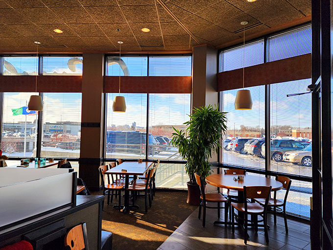 Sun streams through tall windows, illuminating simple wooden tables where countless family celebrations and "just because" meals have unfolded over the years.