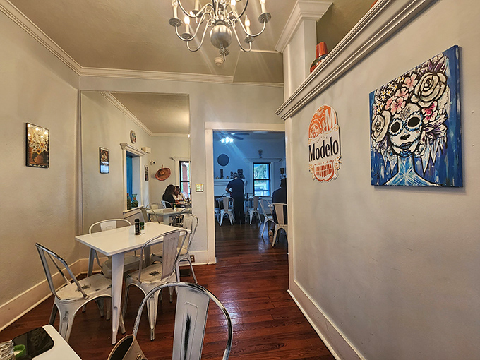 Narrow hallways lined with artwork lead to flavor destinations. This former house maintains its homey charm while serving restaurant-caliber cuisine.