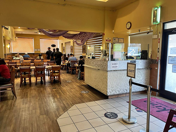 The entrance and host stand welcome you to seafood nirvana. That octopus decoration above seems to say "abandon diet, all ye who enter here."
