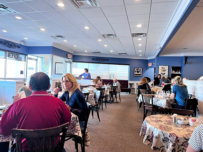 Tables adorned with floral patterns create the perfect backdrop for morning conversations that range from profound to profoundly caffeinated.