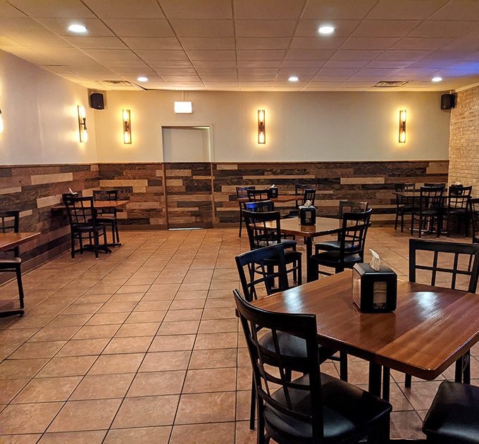 Another dining room where conversations flow as freely as the sauce, under warm lighting that flatters both food and faces.