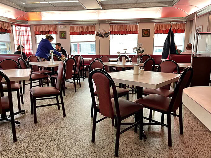 The dining room waits patiently for its next round of customers, each table a blank canvas ready for memories, conversations, and inevitable food photos.