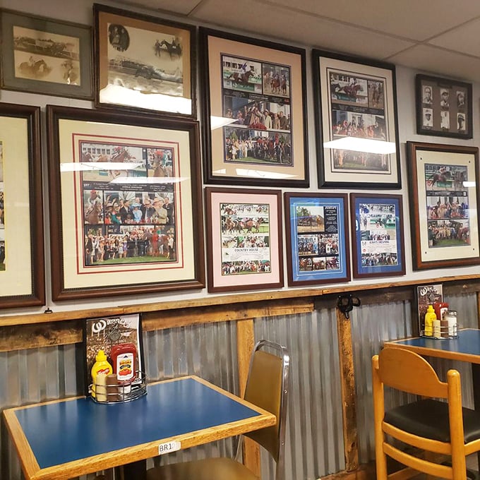 Blue tables beneath racing legends &ndash; where every meal comes with a side of Derby history and conversations about "the good old days."