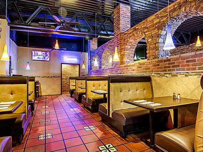 Cozy booths that invite lingering conversations, where exposed brick and pendant lighting create the perfect atmosphere for both first dates and family celebrations.