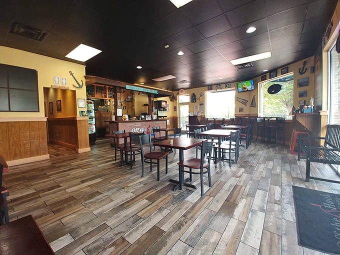 Inside Off The Hook, where the wood-toned interior creates the perfect backdrop for the real star of the show&mdash;whatever's about to land on your plate.