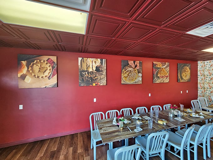 The dining area's rustic charm and pie-themed artwork serve as a gentle reminder of your purpose here: forget the diet, embrace the pie.