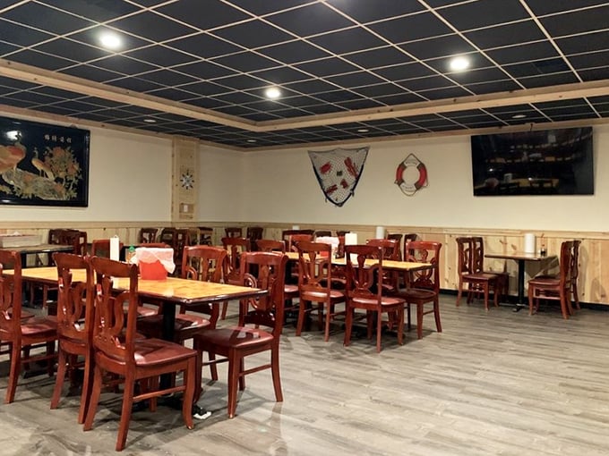 The dining room's warm wood tones and nautical accents create a space where you can focus on what matters: cracking, dipping, and savoring.