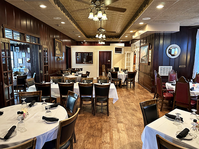 Dark wood paneling, white tablecloths, and ceiling fans spinning stories&mdash;this dining room has been setting the stage for celebrations since your grandparents' first date.