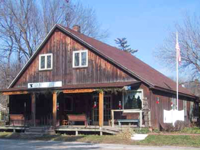 The rustic wooden storefront offers a porch that practically demands you sit a spell and watch the world not hurry by.