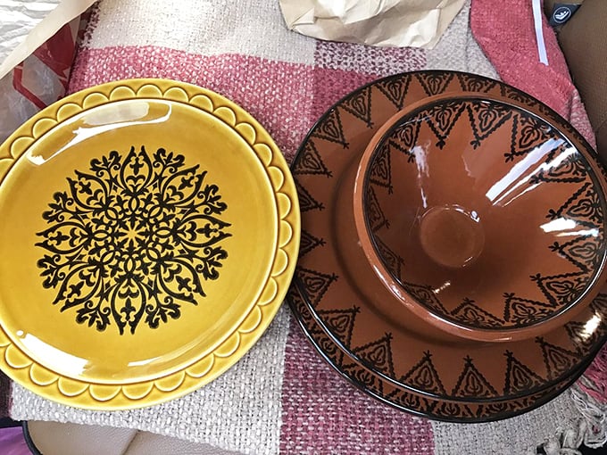 Vintage kitchenware in sunny yellow and earthy terracotta that would make any dinner guest ask, "Where did you find these treasures?"