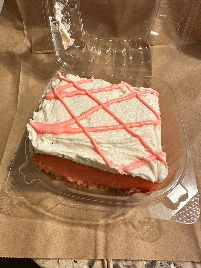 A slice of cake that doesn't just end the meal&mdash;it provides the grand finale. That pink lattice frosting is pure showmanship.