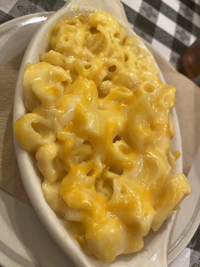 Mac and cheese here isn't a side dish&mdash;it's the main event, with each elbow pasta wearing a coat of cheese so rich it could buy a small country.