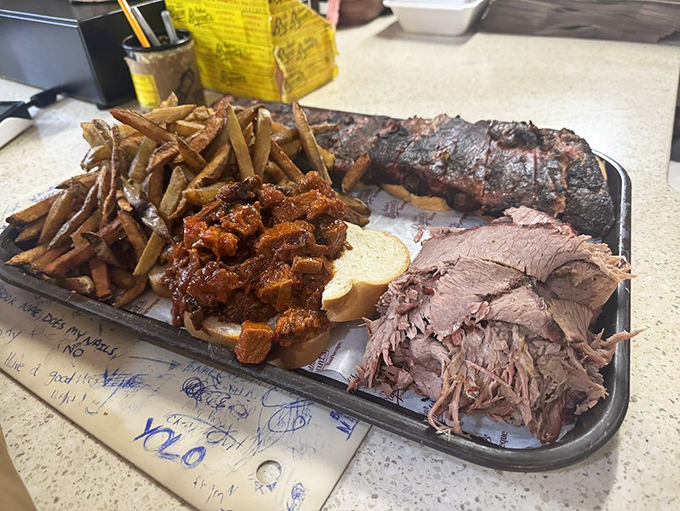 The barbecue sampler that answers life's most important question: "Why choose one meat when you can have them all?"