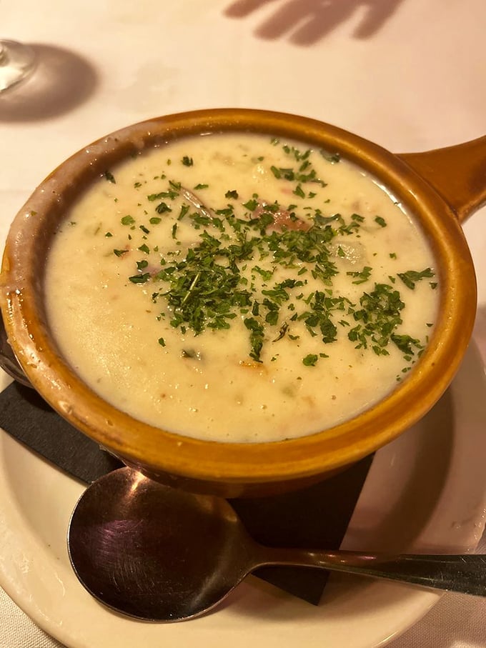 Clam chowder that demands respect&mdash;creamy, substantial, and adorned with fresh herbs. New England's finest tradition finds a worthy home in North Carolina.