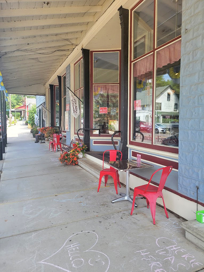 The sidewalk seating area offers prime small-town people-watching with a side of fresh air. Those red metal chairs aren't just seating&mdash;they're front-row tickets to Stockholm's Main Street theater.