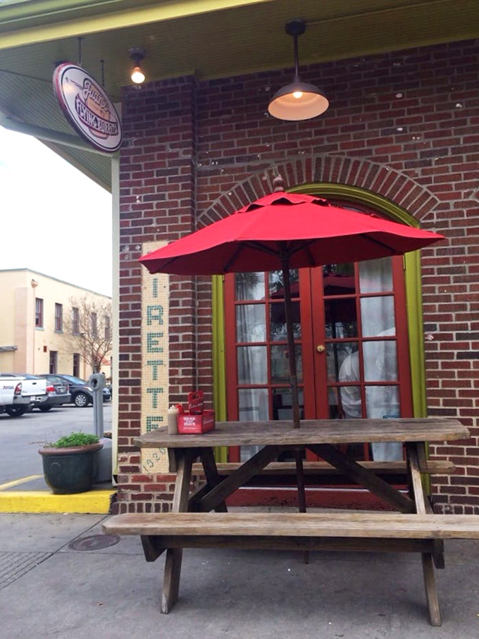 The brick exterior says "established" while the colorful accents whisper "but we're still fun." Outdoor seating that invites you to linger just a little longer.