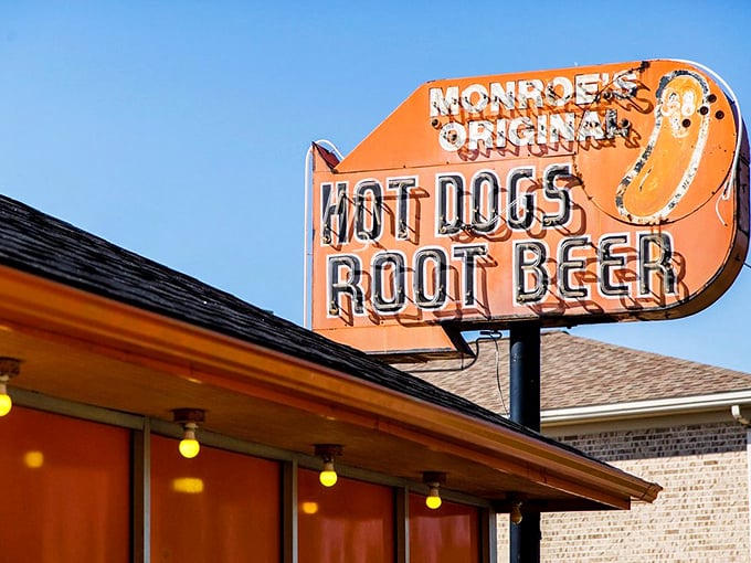 That vintage sign has guided countless hungry souls to hot dog nirvana. Some religious pilgrimages have less inspiring destinations.