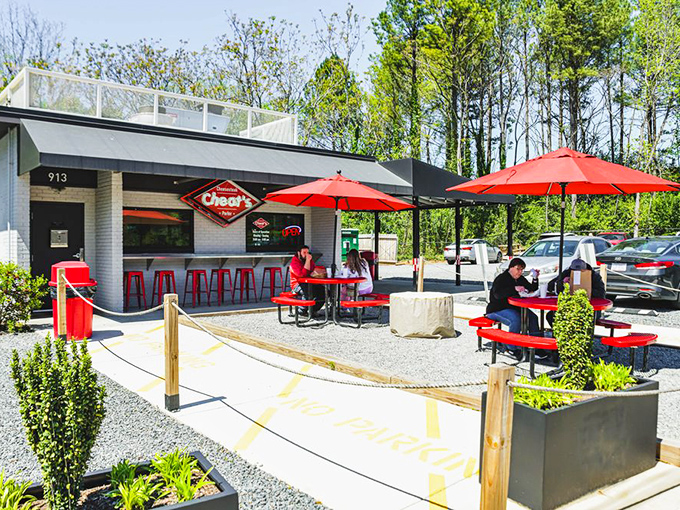 Red umbrellas and picnic tables create that perfect casual dining atmosphere where memories are made between bites of perfectly prepared cheesesteaks.