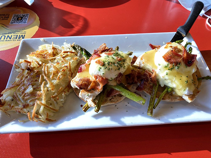 Perry's Benedict &ndash; where breakfast gets dressed up but keeps its sense of humor. Those asparagus spears standing at attention deserve a military salute.