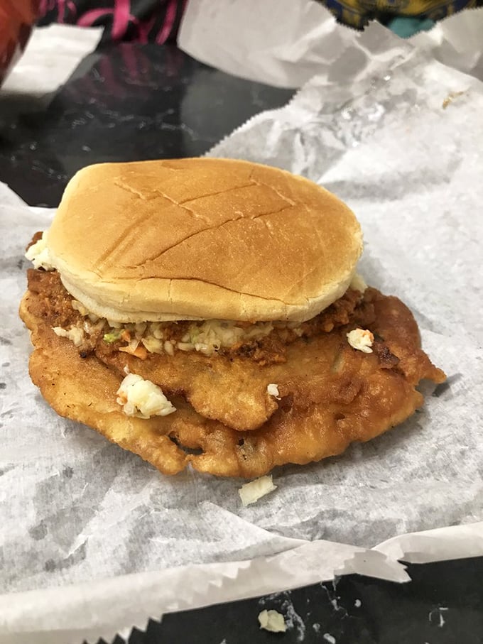 The legendary pork chop sandwich - a crispy-battered marvel that's been bringing joy to Mt. Airy since the 1960s.