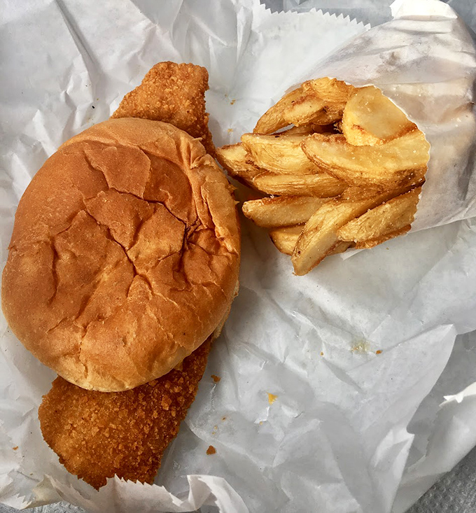 The breaded pork tenderloin sandwich&mdash;crispy, juicy, and larger than its bun in the best possible way.