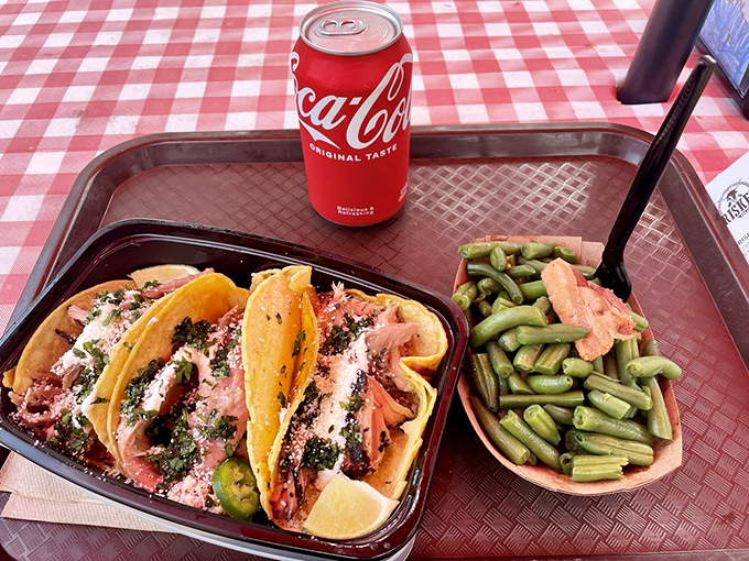 Street tacos reimagined through a BBQ lens&mdash;pulled pork nestled in corn tortillas with green beans that aren't just an afterthought but a revelation.