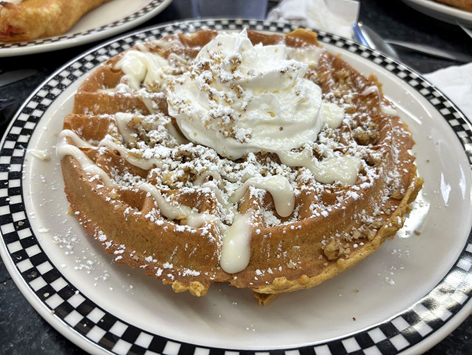 This waffle isn't just breakfast&mdash;it's dessert with an alibi. Crowned with whipped cream and powdered sugar, it's the morning indulgence you've earned.